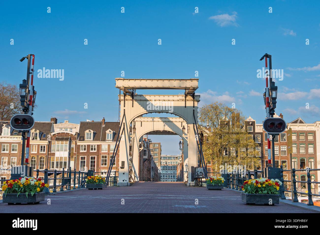 Iconic Skinny Bridge over Amstel River in Amsterdam, Netherlands. Dutch ...
