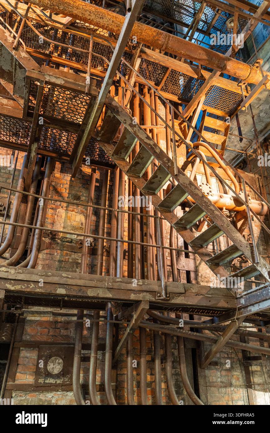 Intricate Metal Staircase and Pipe System in an Industrial Interior ...