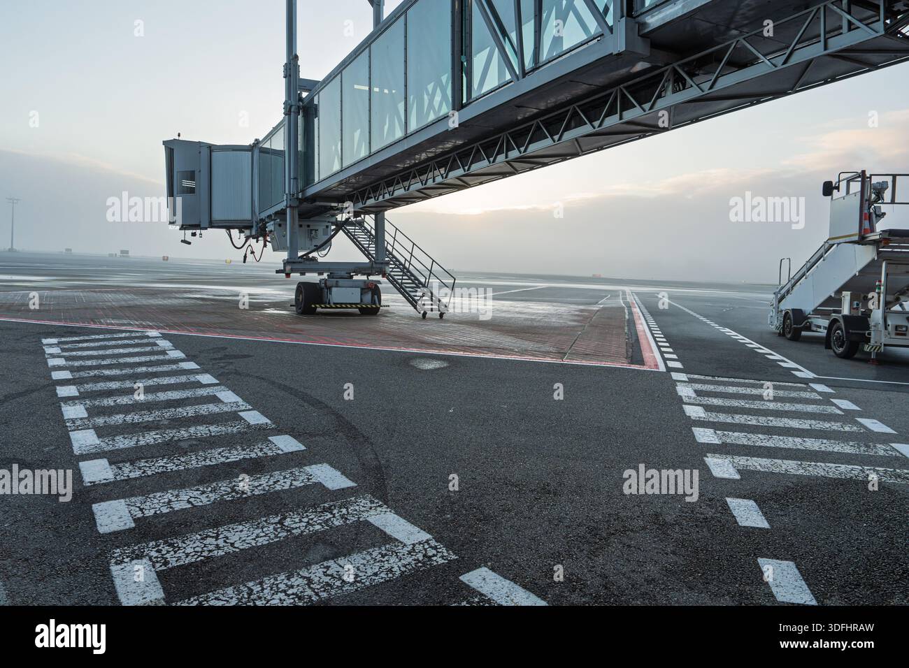 Airport Terminal and Jet Bridge at Dawn A Gateway to Travel and ...