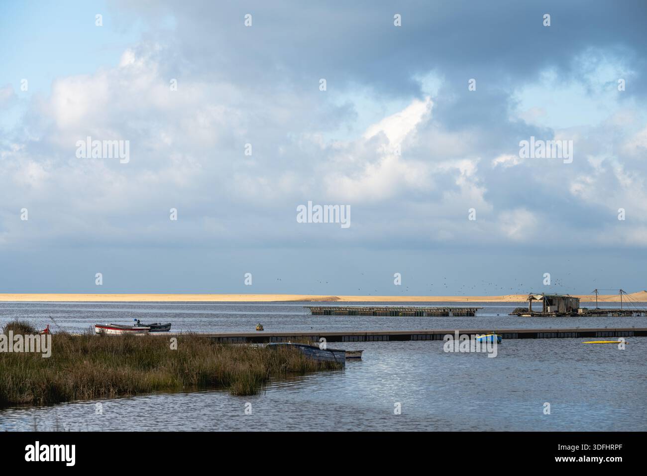 Sesimbra Portugal December 25 2025. Long wooden pier stretches across ...