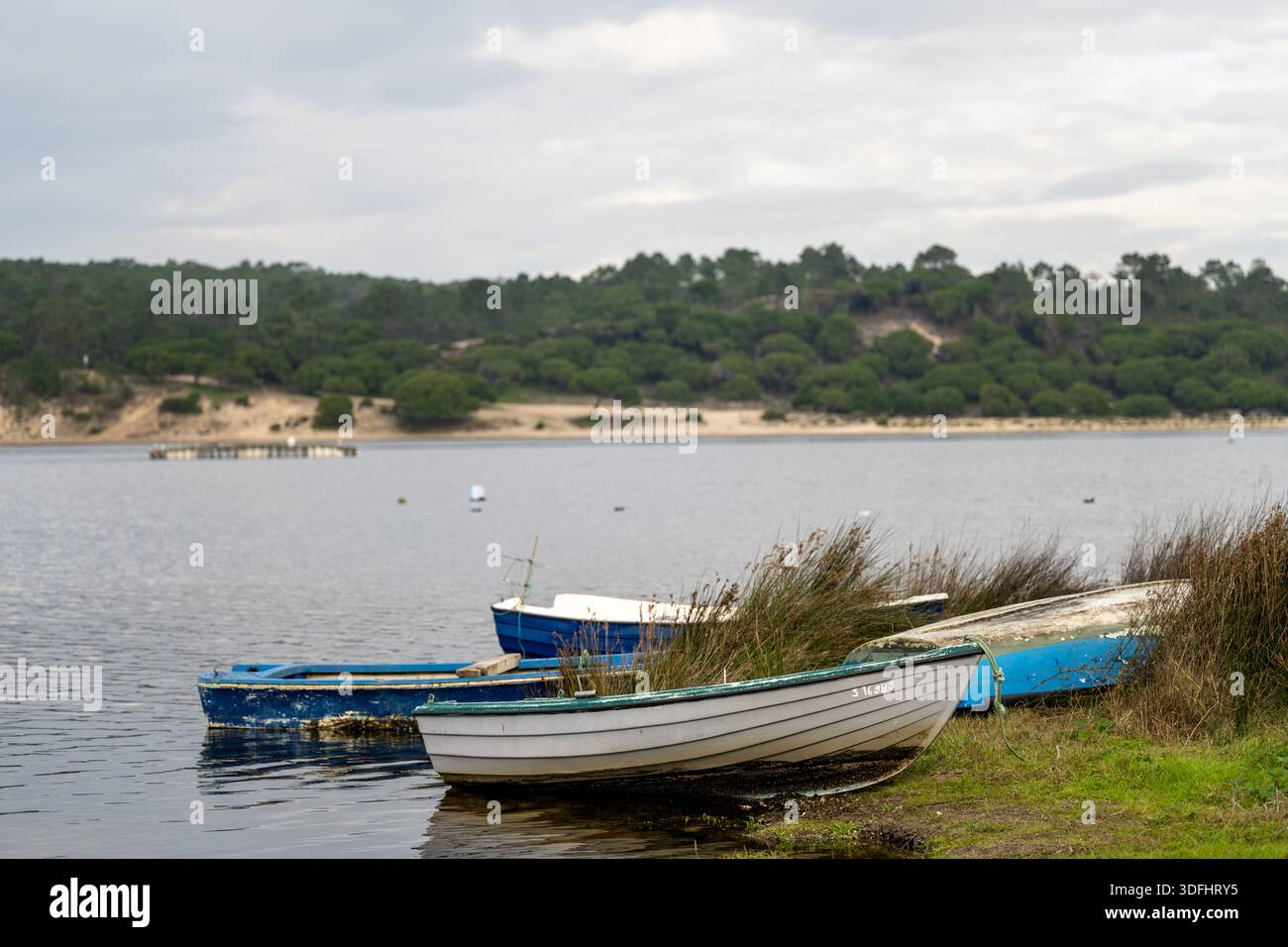 Sesimbra Portugal December 25 2025. Small fishing boats rest along the ...