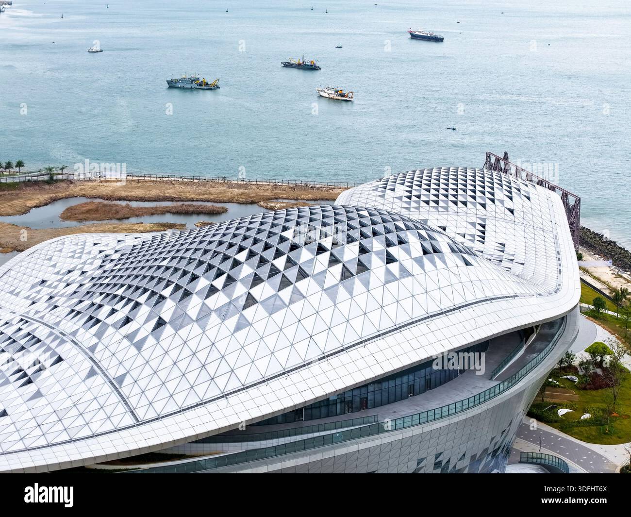 ZHANJIANG, CHINA - DECEMBER 25, 2025 - Aerial view of the new landmark ...