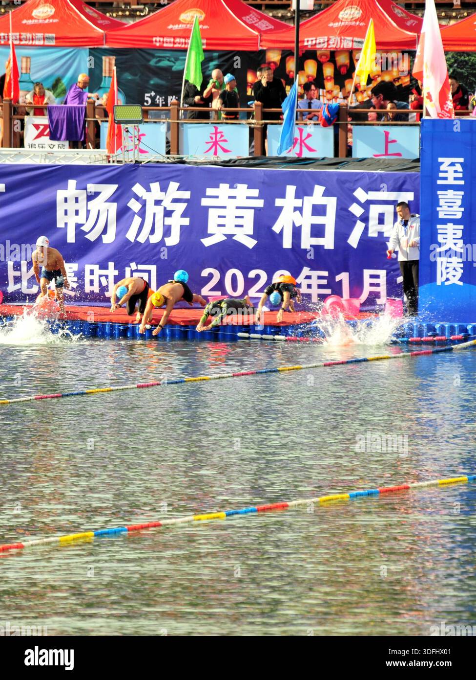Athletes participate in a winter swimming competition in Yiling ...