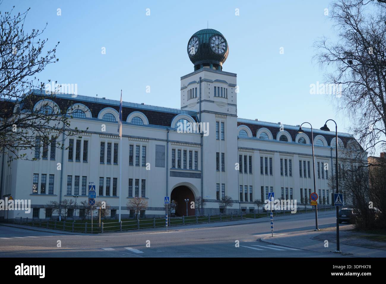 A striking image of a historic building featuring a prominent clock ...