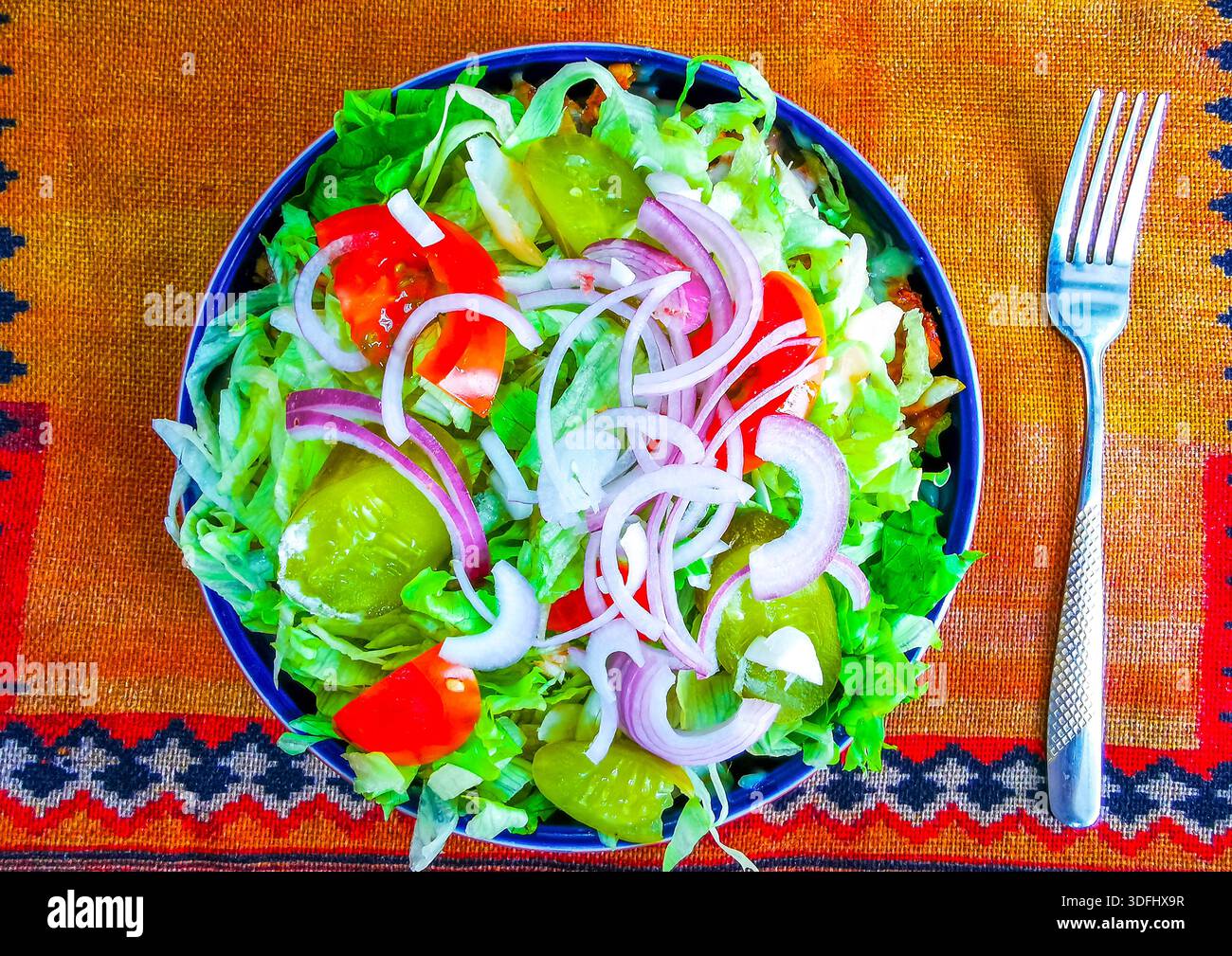 Delicious salad and kebab in a Turkish restaurant with onion cucumber ...