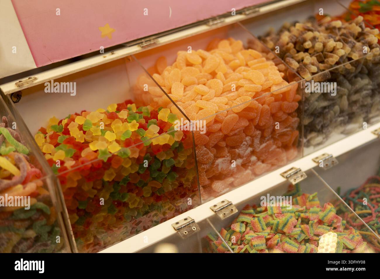 Colorful assortment of gummy candy and sweet sugary treat displayed ...