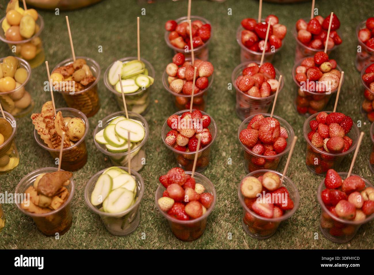 Healthy street food stall market displaying plastic cup filled with ...