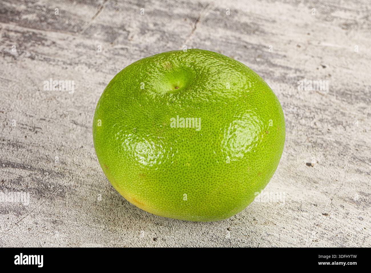 Green ripe fruit sweetie citrus over background Stock Photo - Alamy