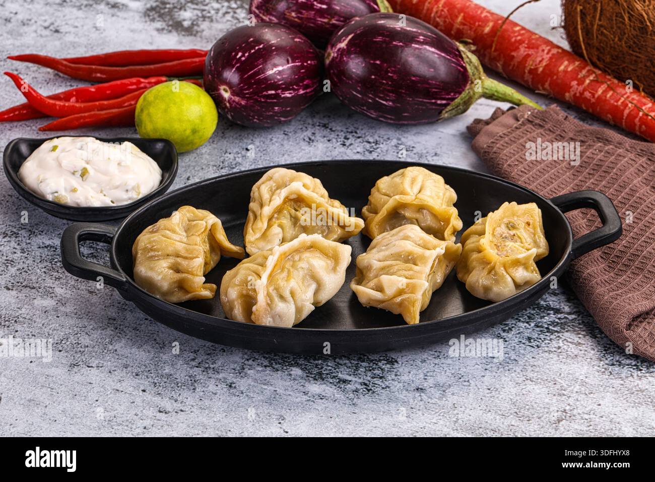 Steamed Nepali traditional Momo stuffed dumplings Stock Photo - Alamy