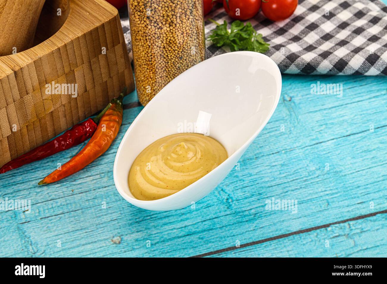 Spicy yellow mustard sauce dip flavoring Stock Photo - Alamy
