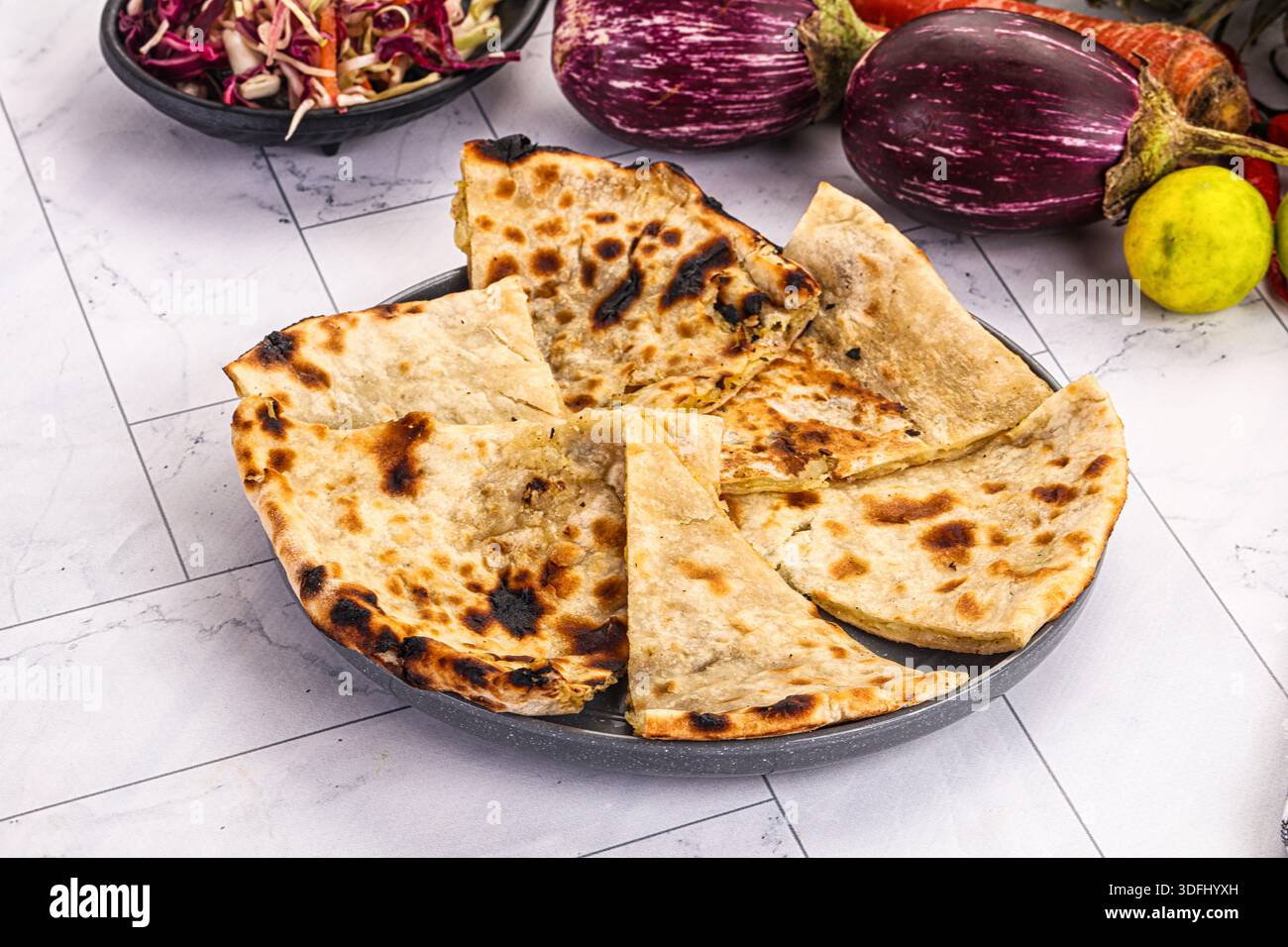 Indian stuffed potato bread Aloo Paratha Stock Photo - Alamy