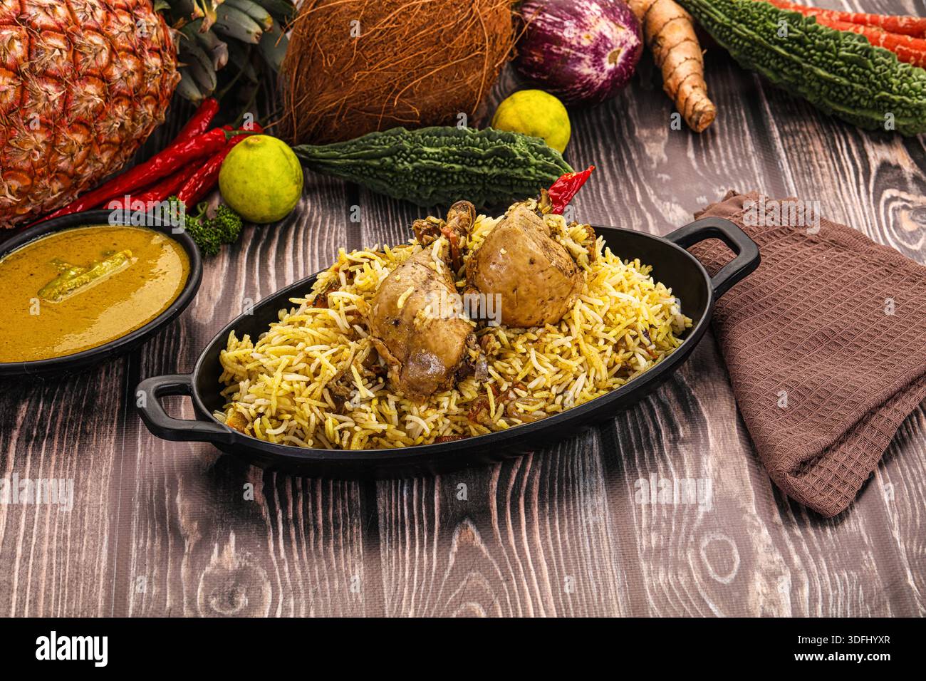 Indian cuisine chicken biryani with basmati rice Stock Photo - Alamy