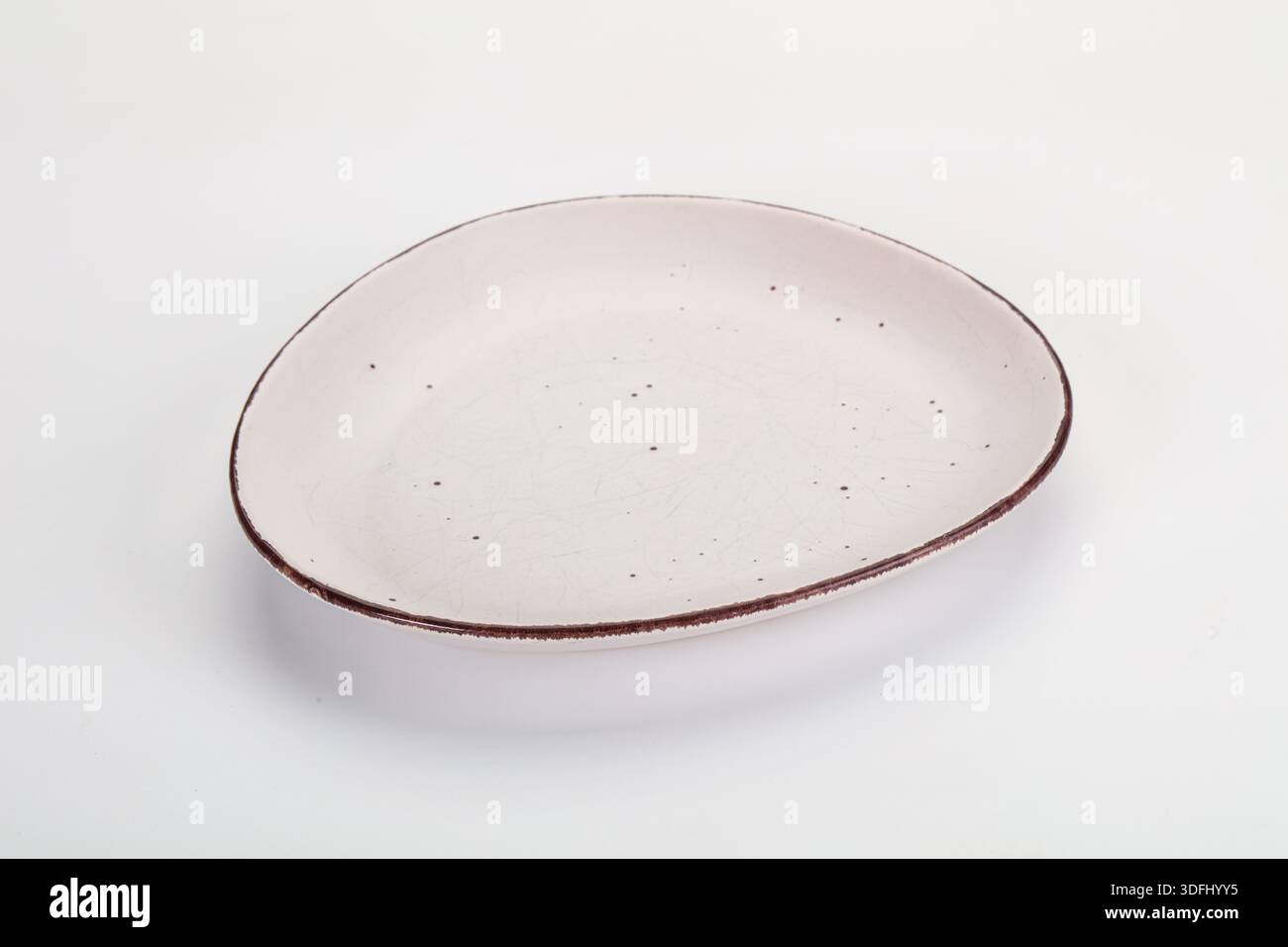 White ceramic empty clean plate dishware Stock Photo - Alamy