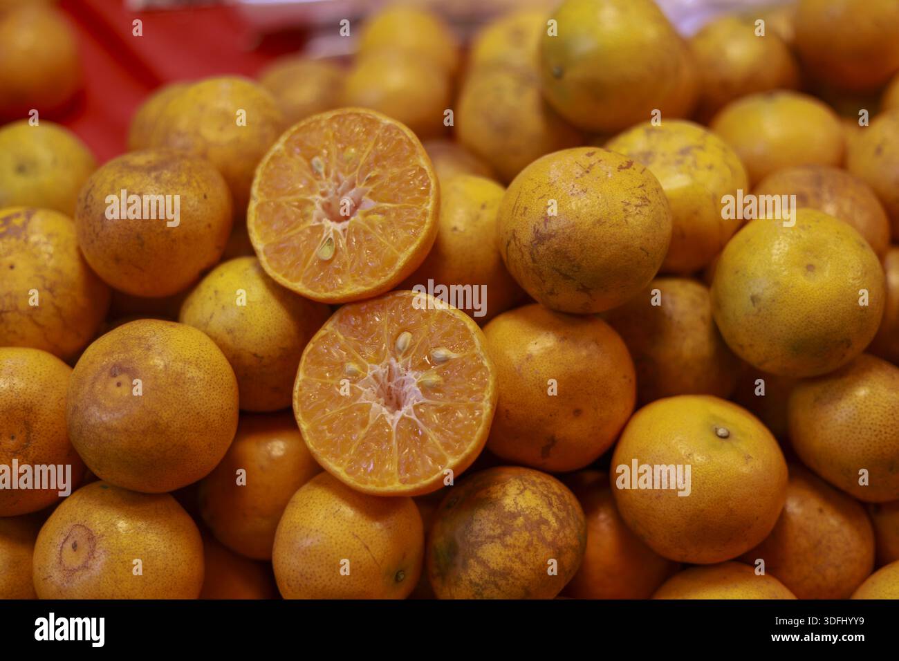 Fresh juicy tangerine fruit pile with sweet citrus halves showing ...