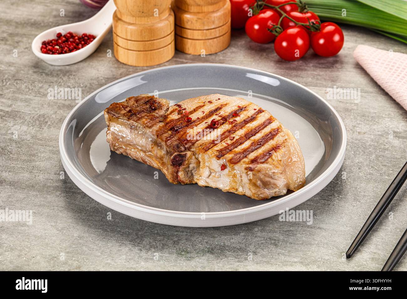 Grilled fat pork loin steak with bone Stock Photo - Alamy