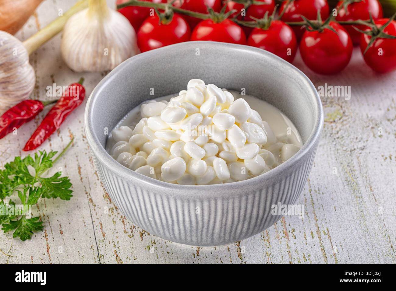 Grain cottahe cheese for breakfast served vegetables Stock Photo - Alamy