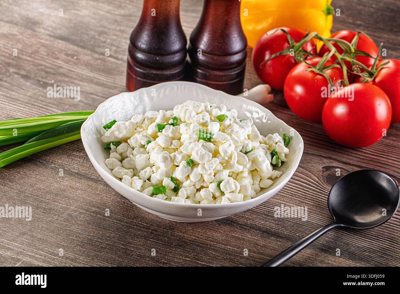 Cottage cheese curd with green onion Stock Photo - Alamy