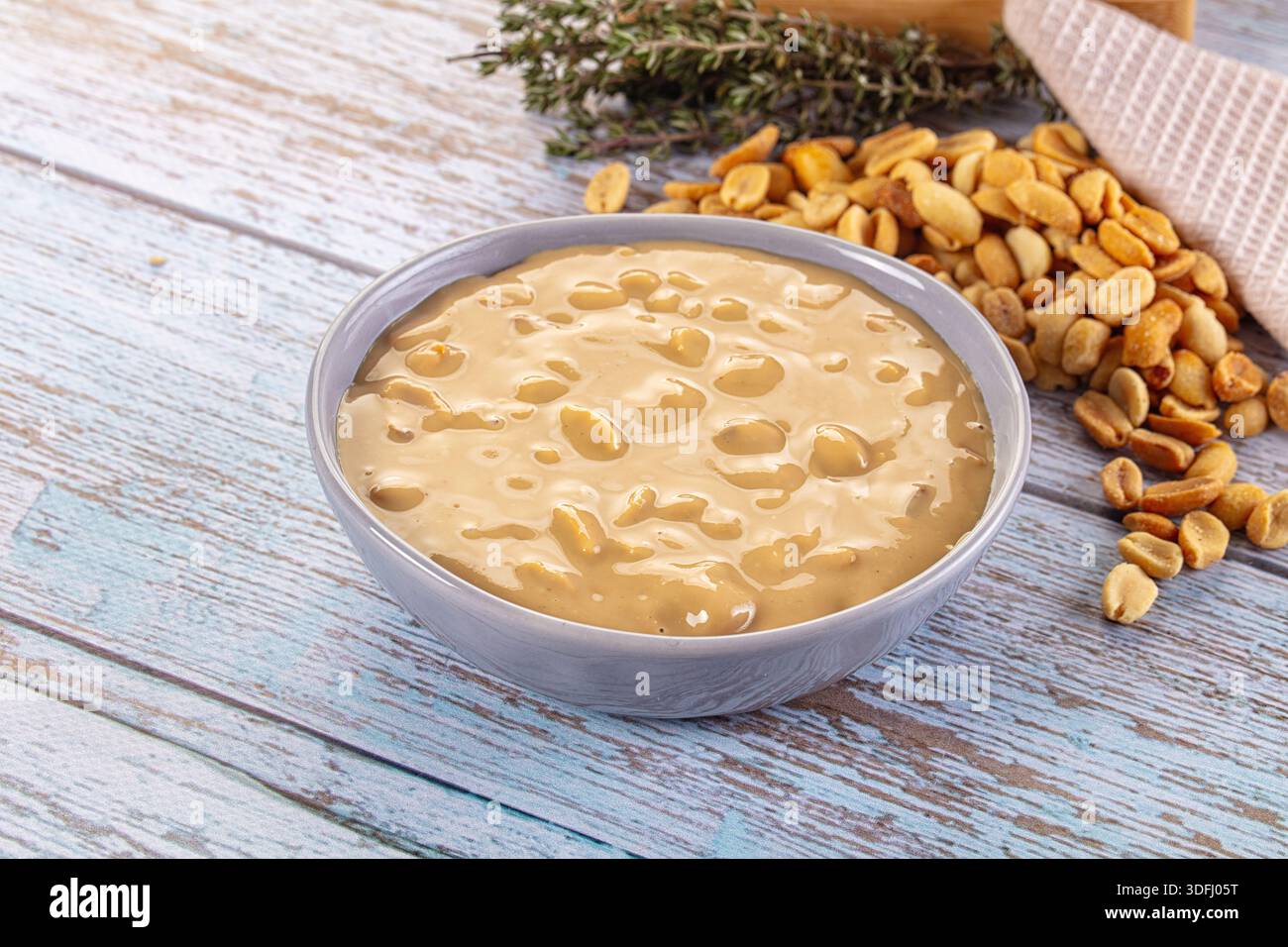 Raw Peanut butter spread with nuts Stock Photo - Alamy