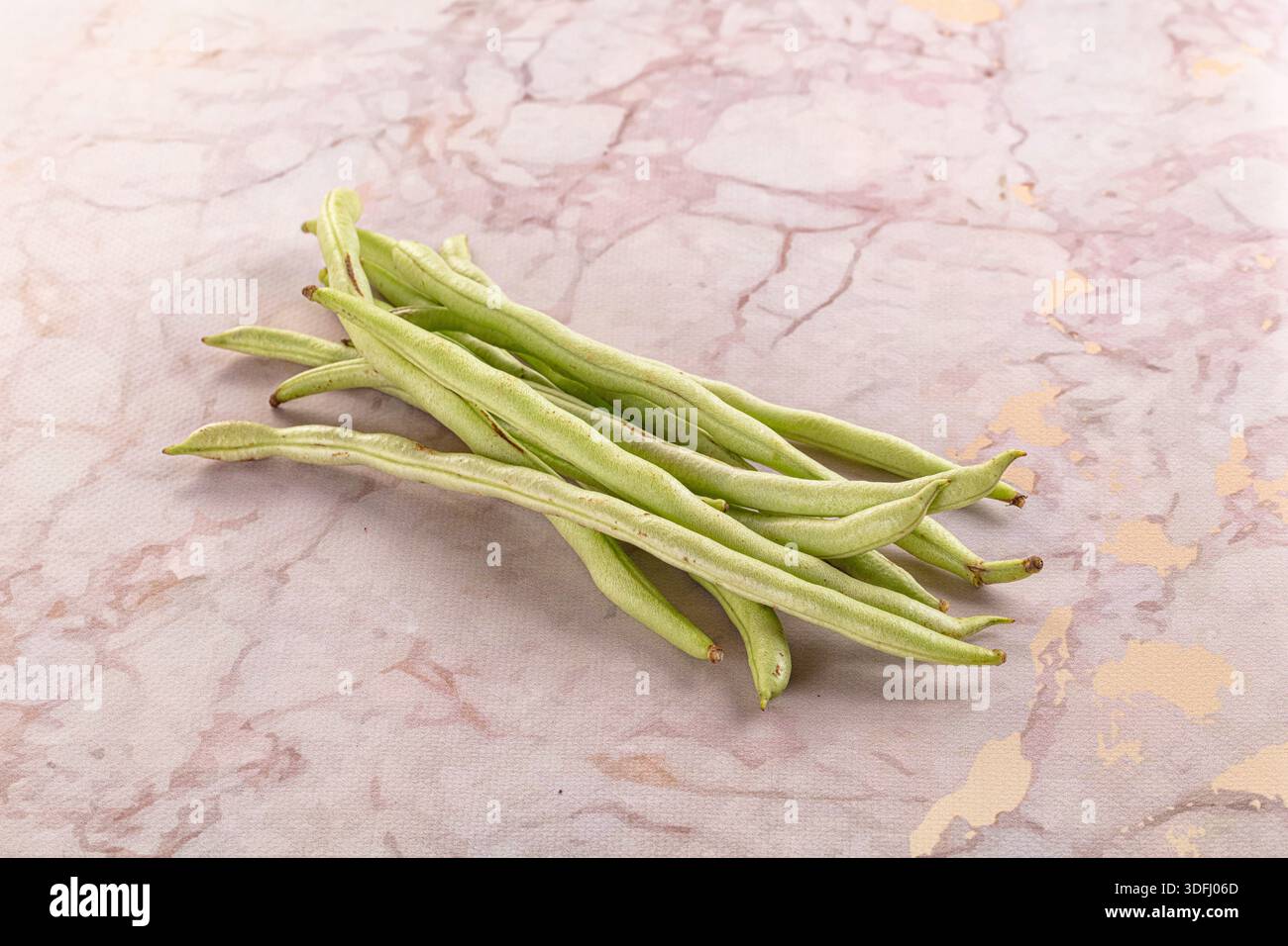 Raw green string beans heap for cooking Stock Photo - Alamy