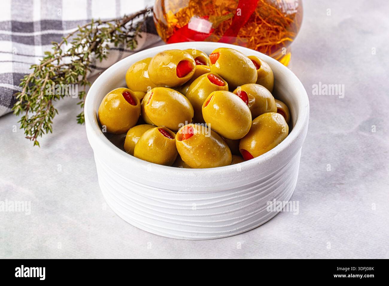 Greek Green olives stuffed red pepper Stock Photo - Alamy