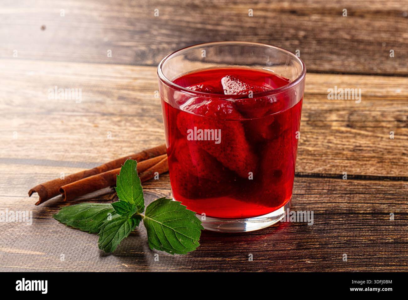 Sweet juicy cold strawberry lemonade served mint Stock Photo - Alamy