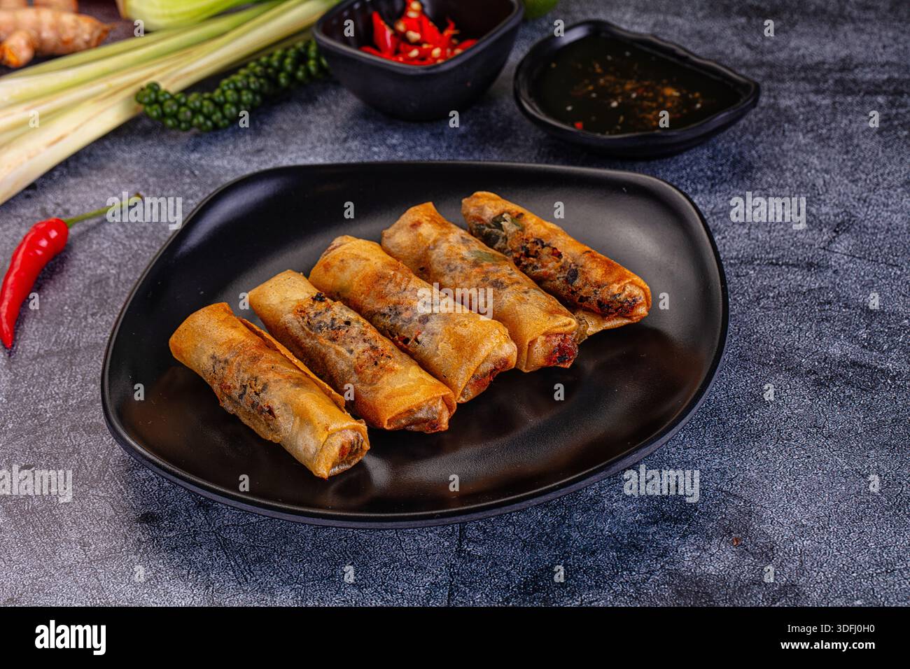 Deep fried Vietnamese stuffed spring rolls Stock Photo - Alamy
