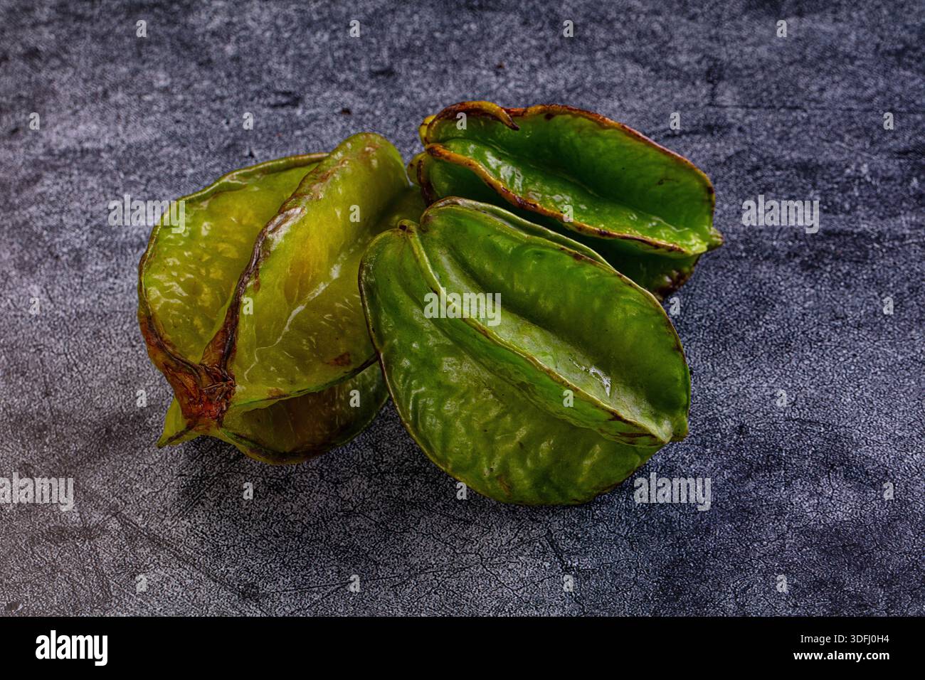 Sweet juicy tropical carambola star fruit Stock Photo - Alamy