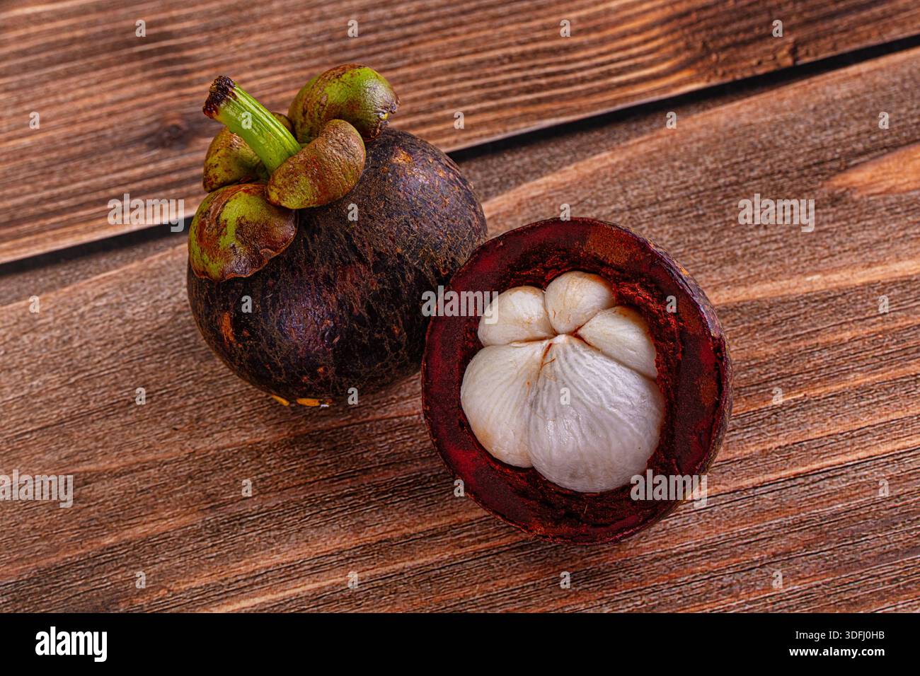 Sweet tropical exotic juicy mangosteen fruit Stock Photo - Alamy