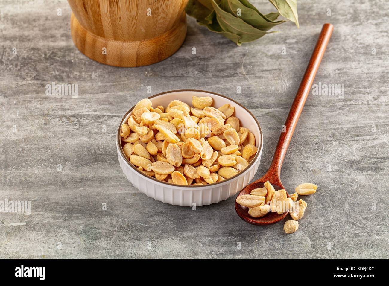 Tasty salted roasted peanut heap in the bowl Stock Photo - Alamy