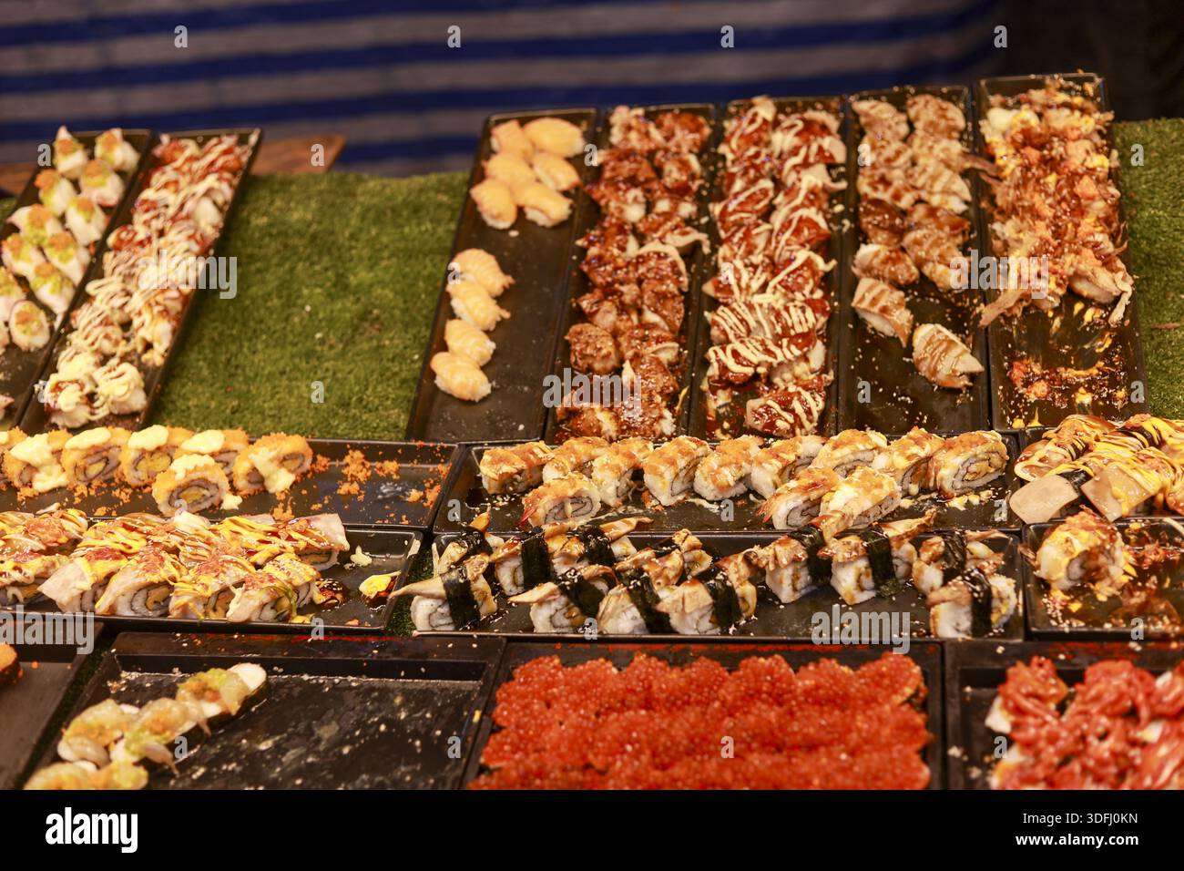 Delicious Japanese sushi food stall offering fresh sashimi nigiri and ...