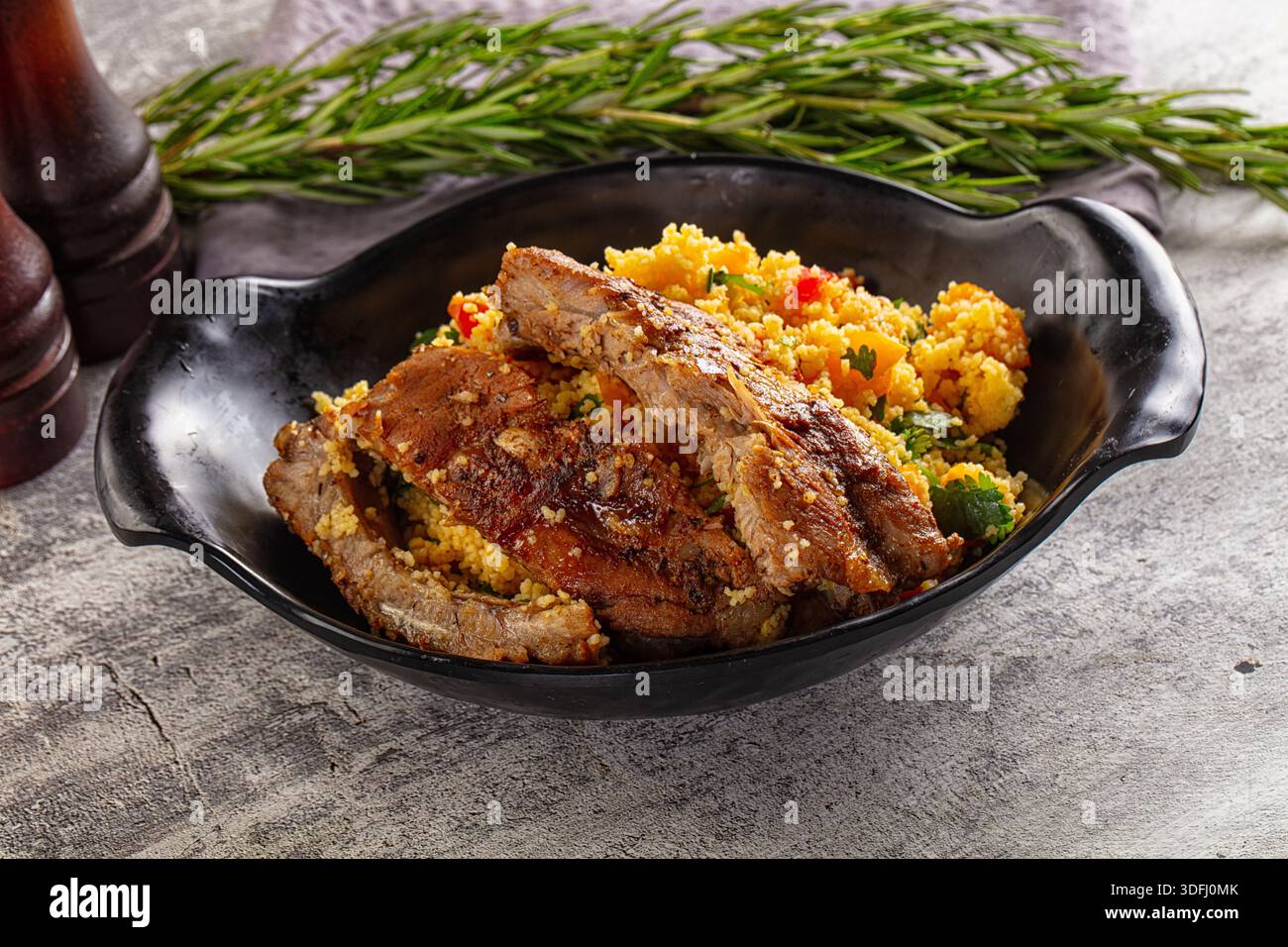 Couscous garnish with ribs and vegetables Stock Photo - Alamy