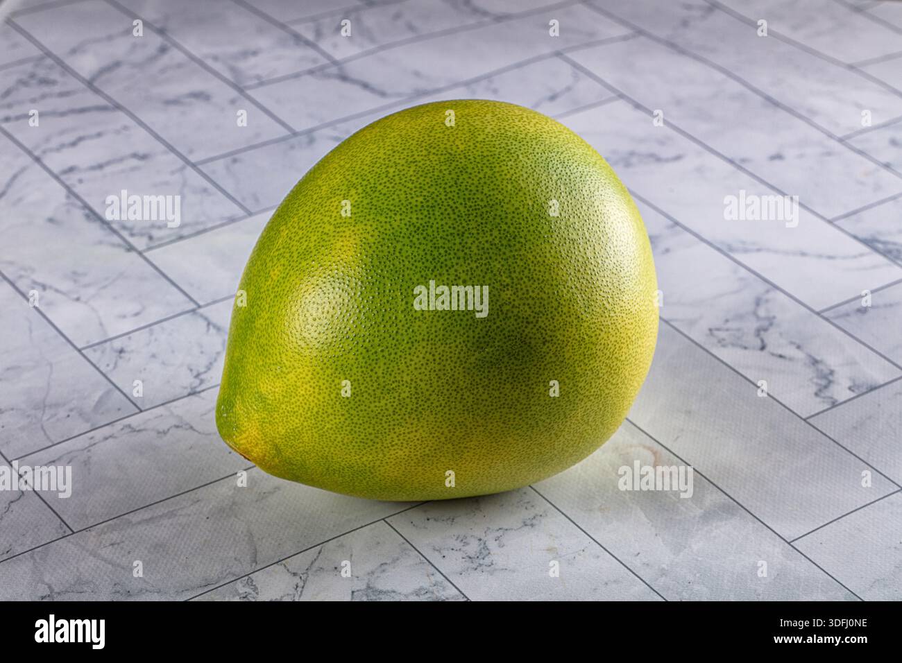 Sweet juicy green tropical Oroblanco citrus Stock Photo - Alamy