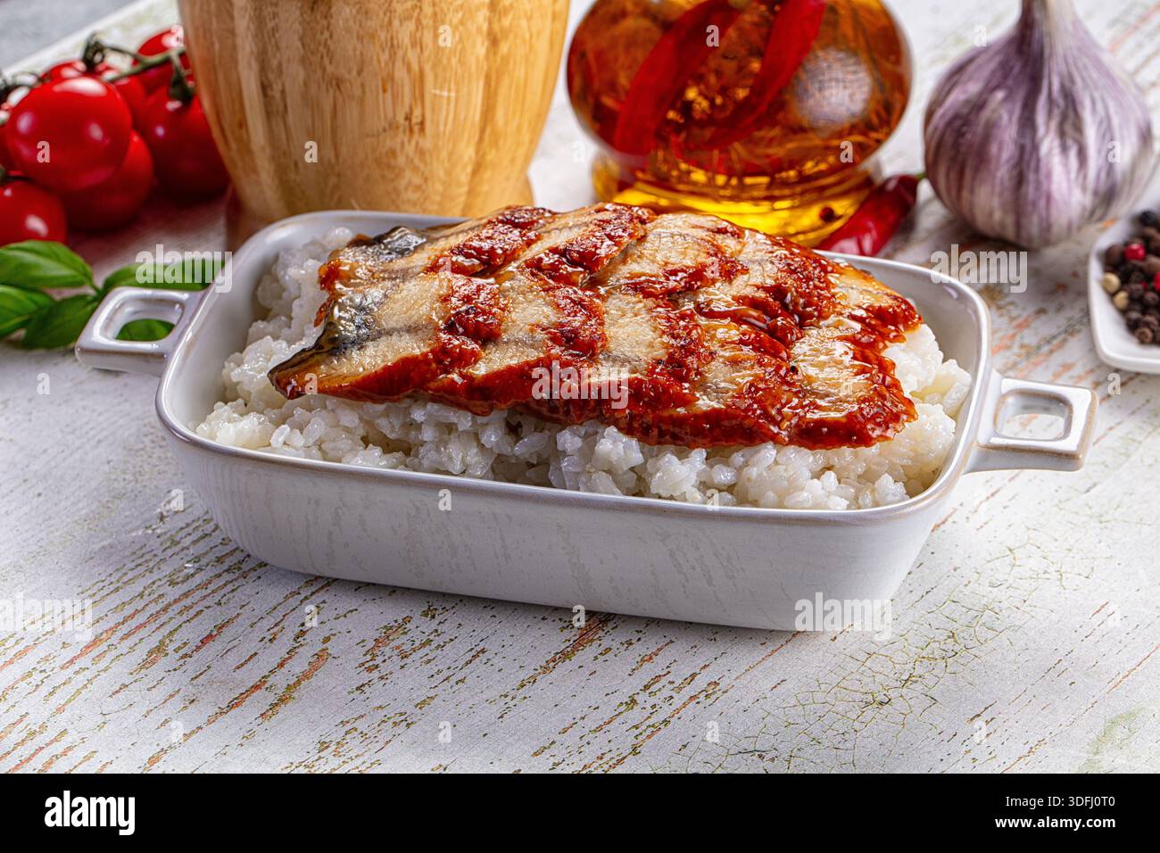 Japanese style cuisine - grilled eel with steamed rice and sauce Stock ...