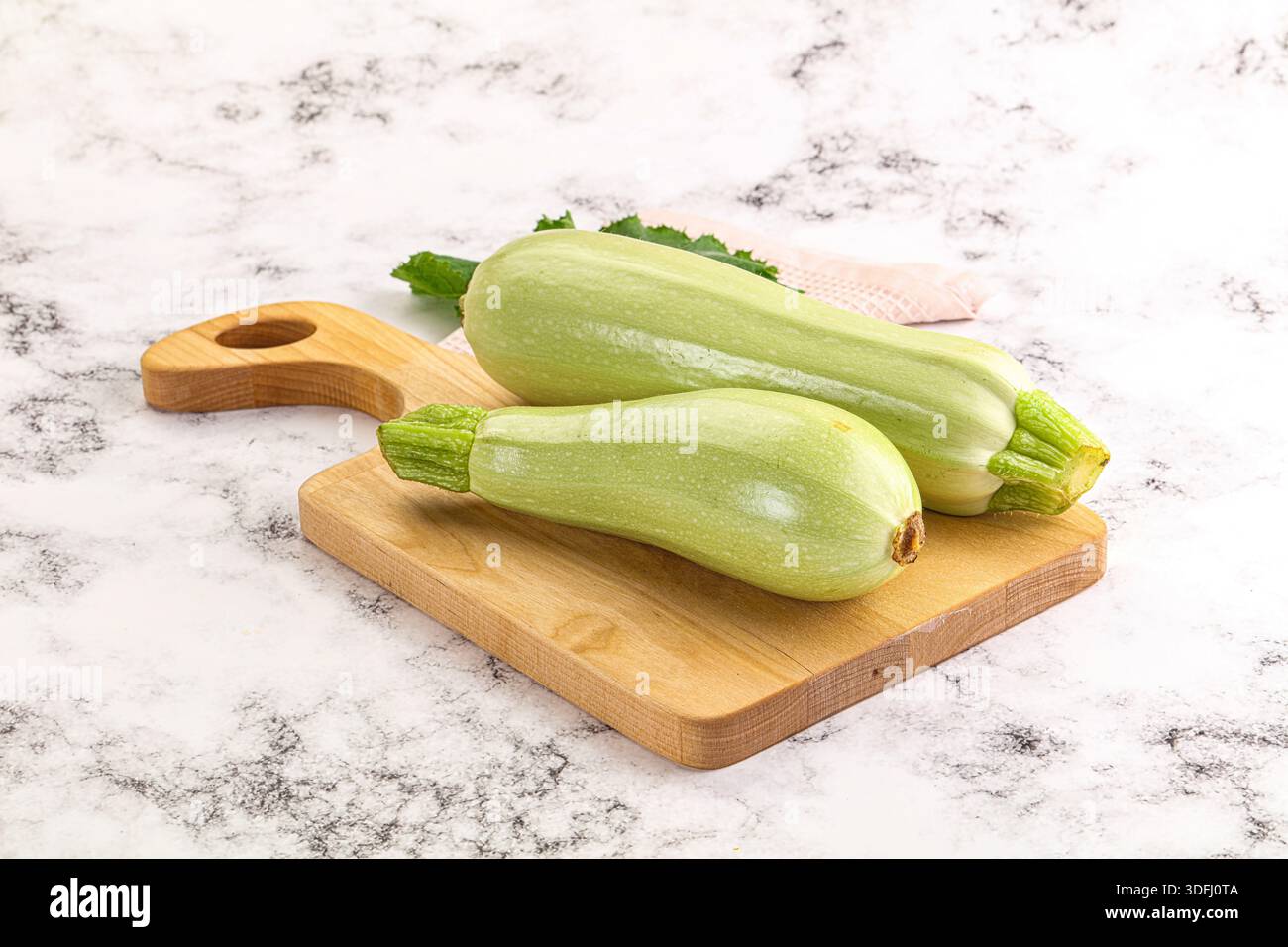 Raw frsh ripe zucchini vegetable for cooking Stock Photo - Alamy