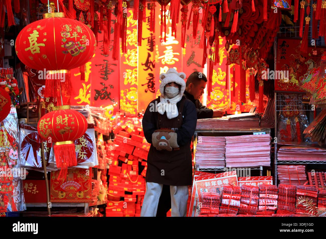 Residents shop for festive decorations at the Huitong Small Commodity ...