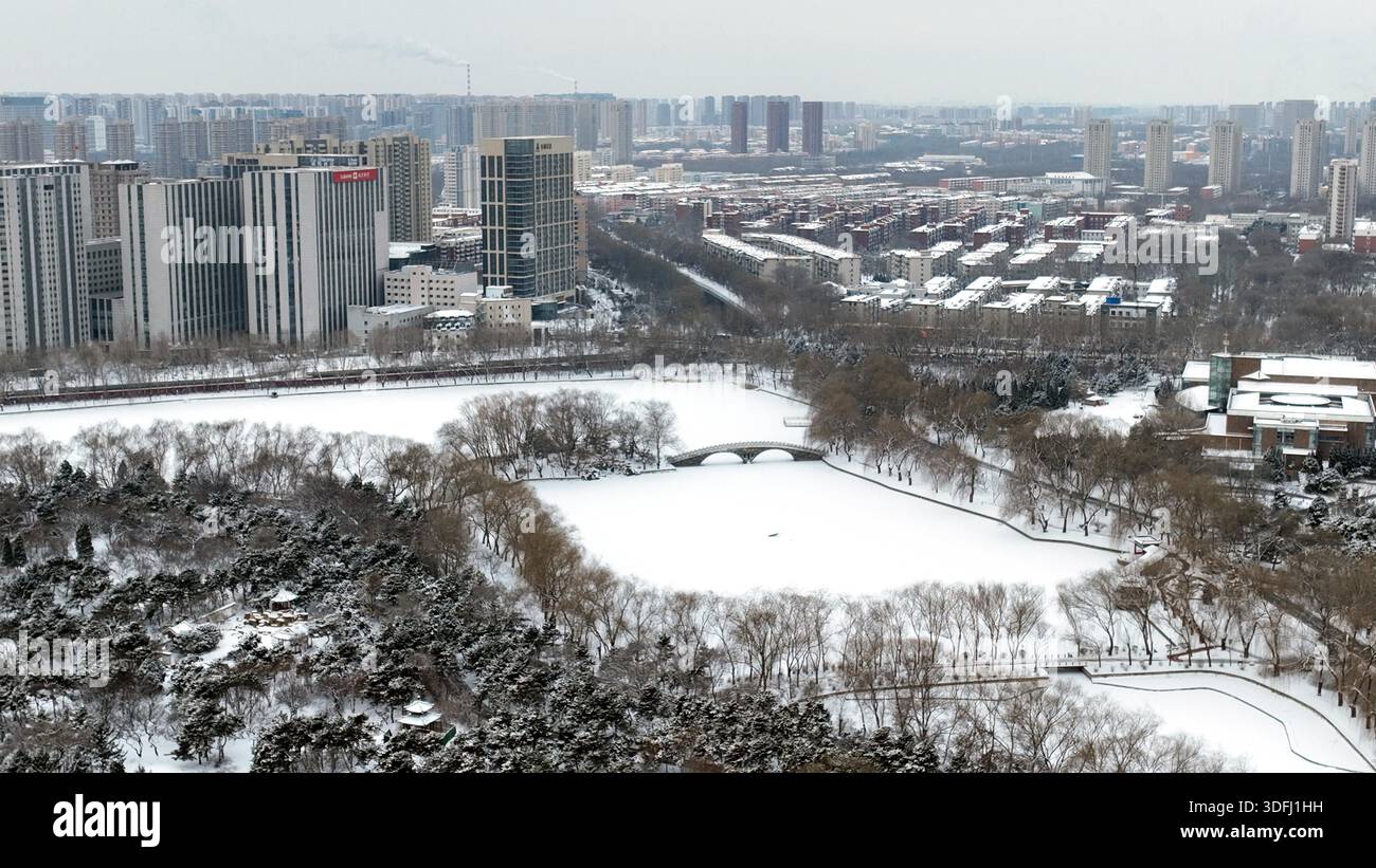 Aerial photo shows the snow scenery at Beiling Park in Shenyang City ...