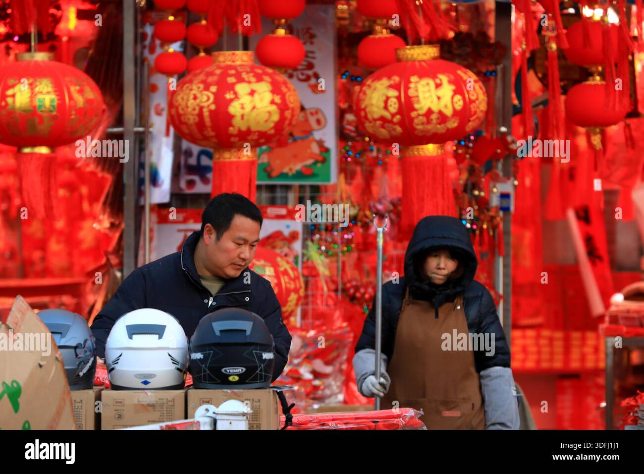 Residents shop for festive decorations at the Huitong Small Commodity ...