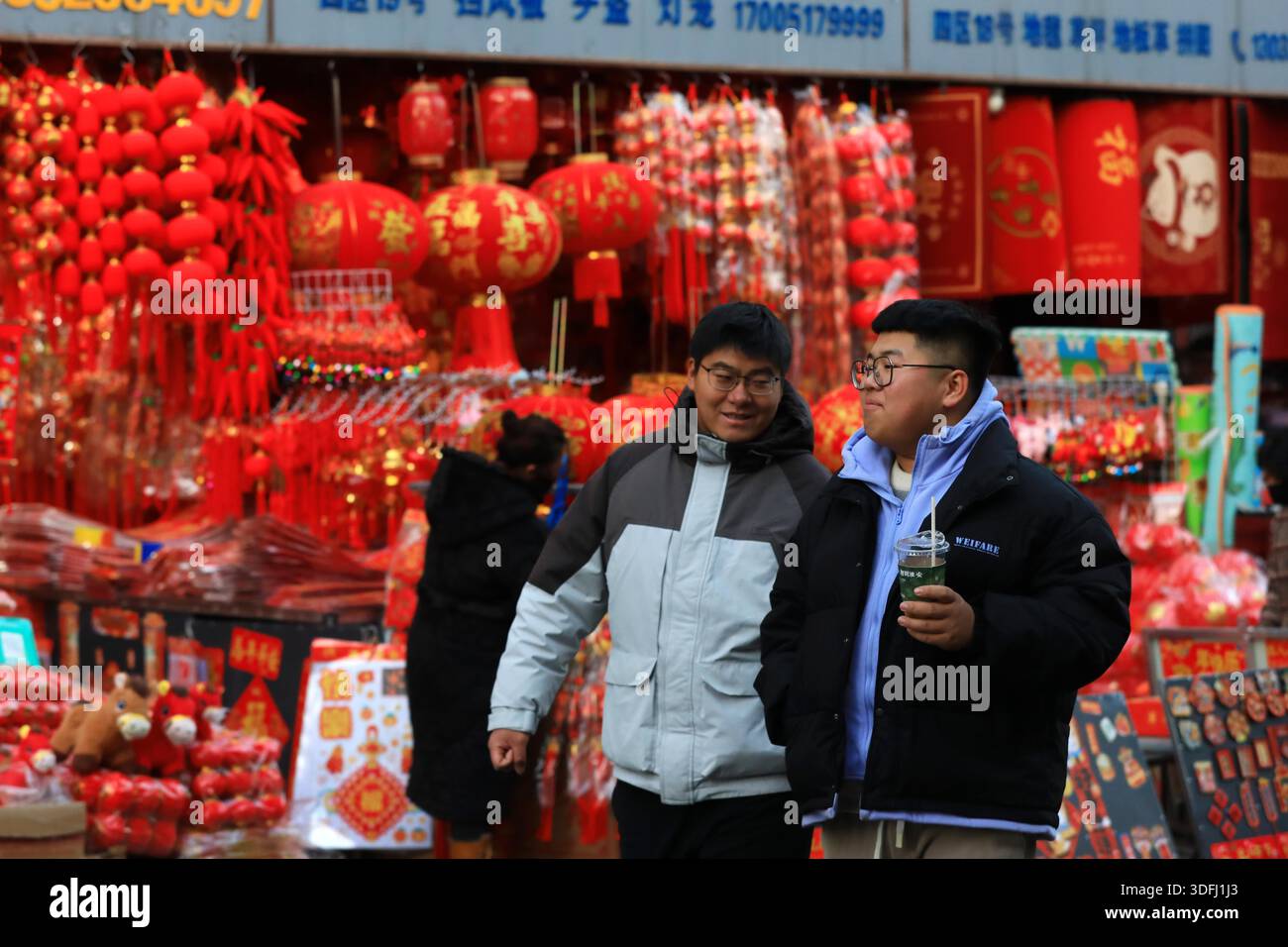 Residents shop for festive decorations at the Huitong Small Commodity ...