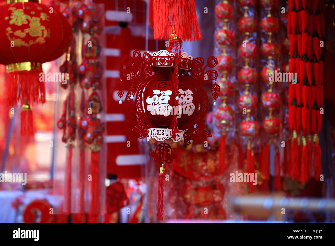 Residents shop for festive decorations at the Huitong Small Commodity ...