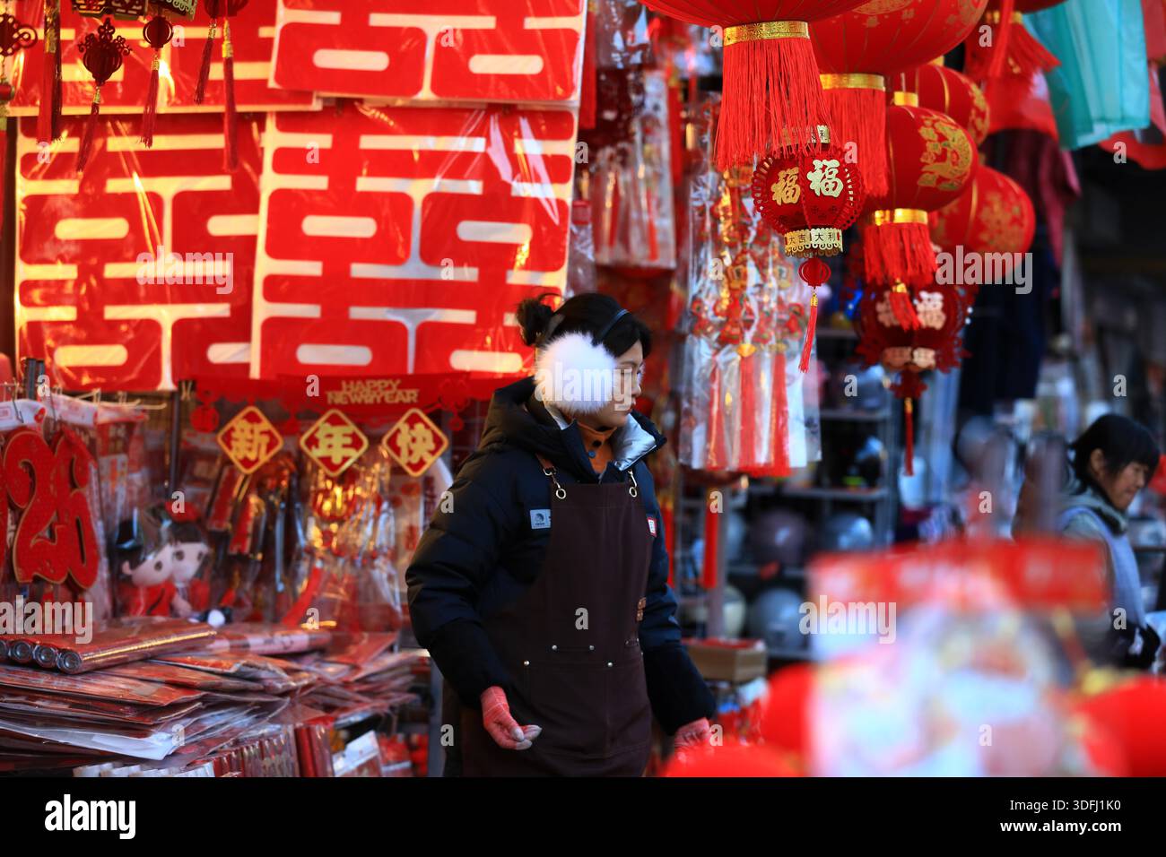 Residents shop for festive decorations at the Huitong Small Commodity ...