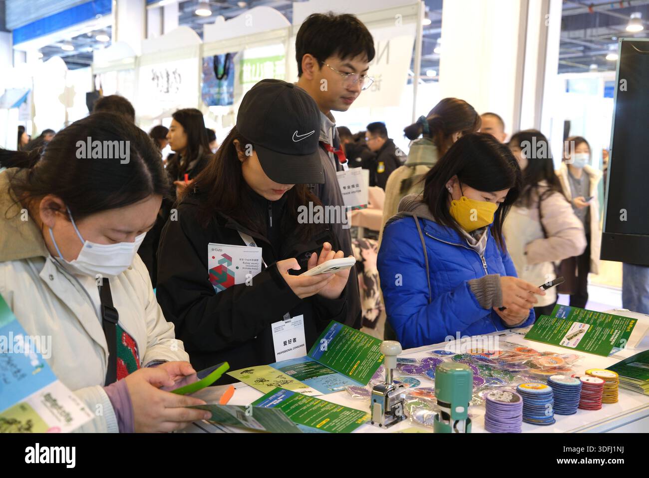 Visitors tour the ISPO Beijing 2026 exhibition at China National ...