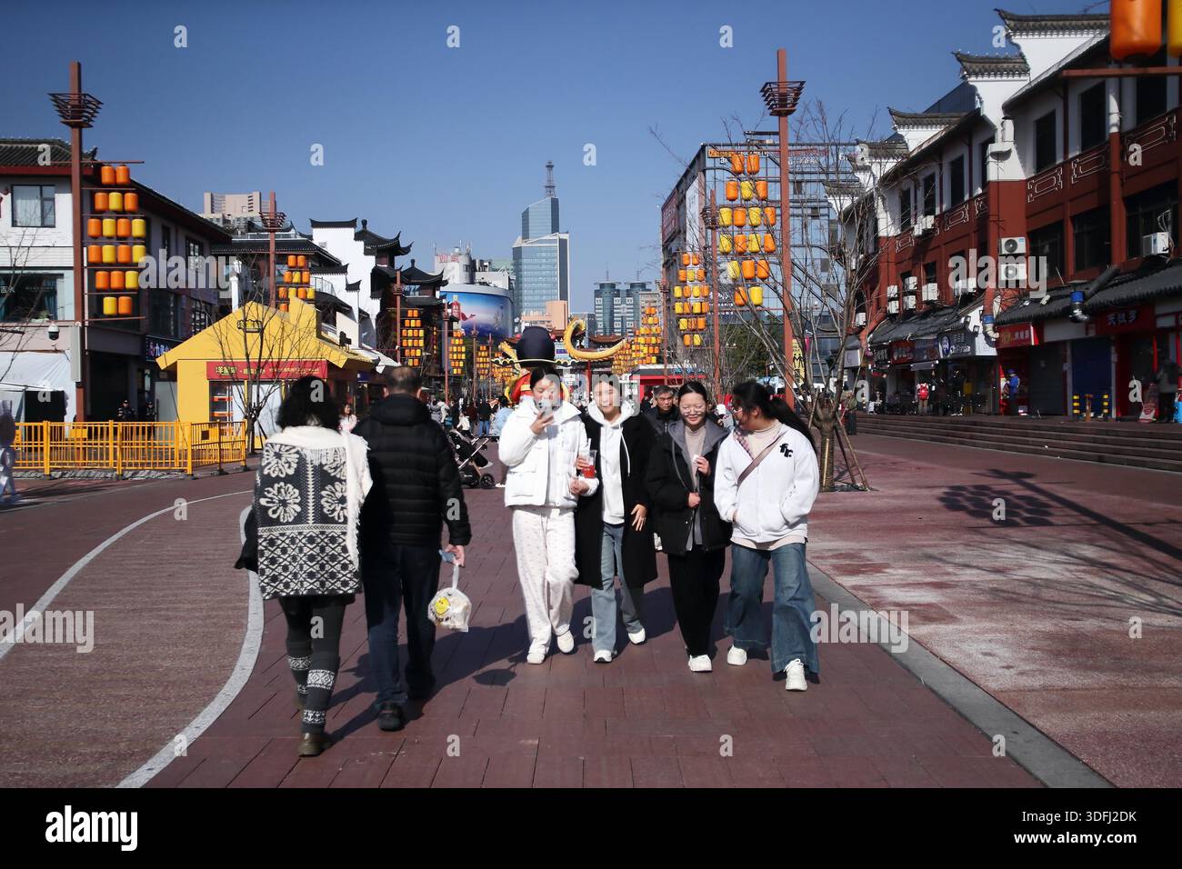 Visitors admire Lunar New Year lantern displays at Chenghuang Temple ...