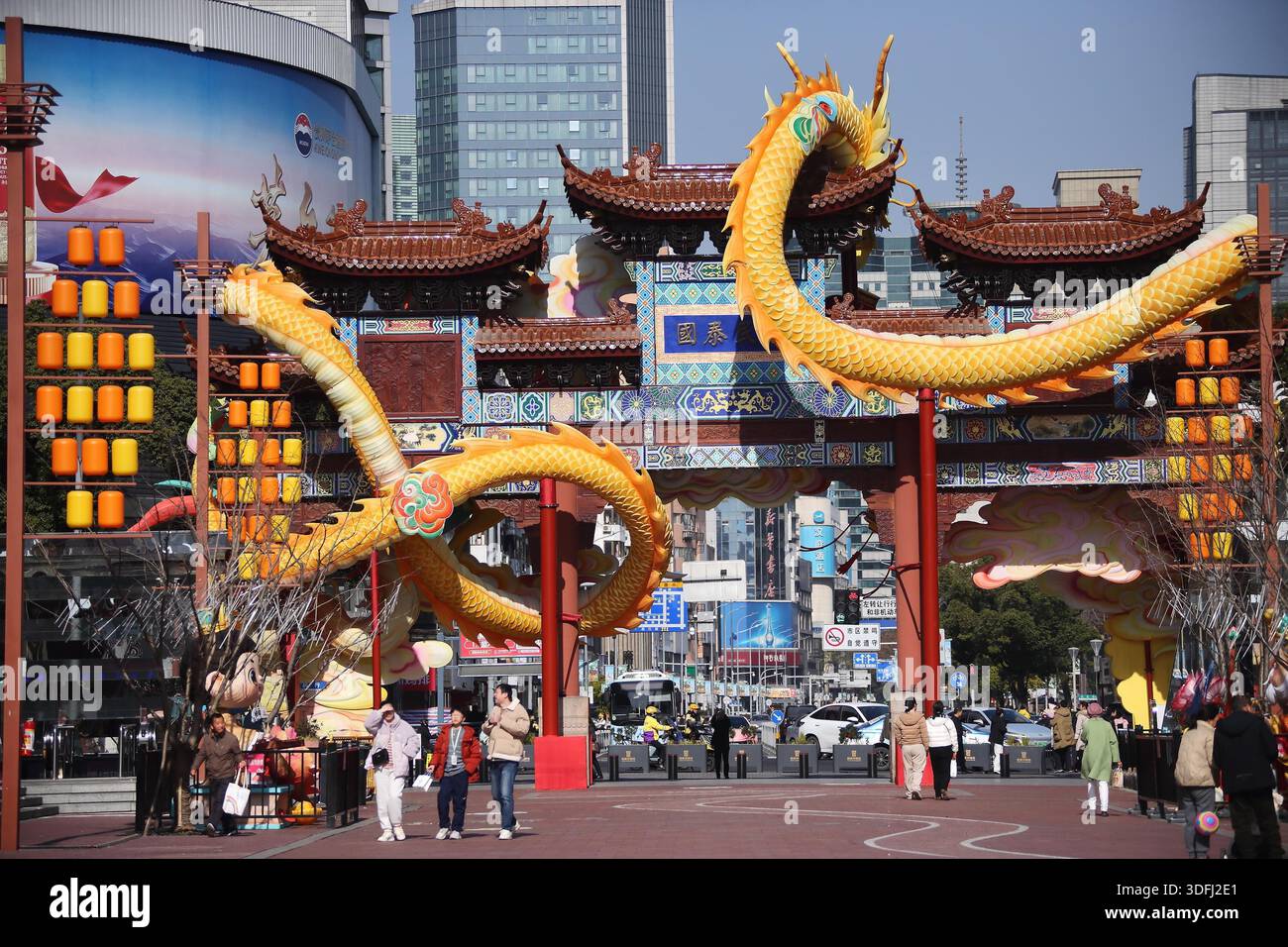 Visitors admire Lunar New Year lantern displays at Chenghuang Temple ...