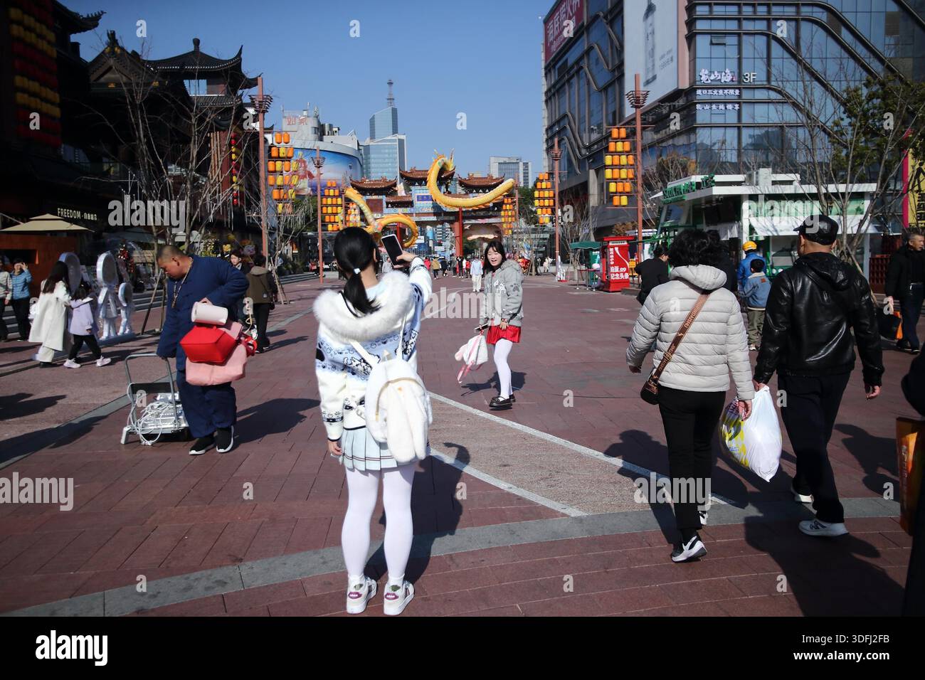 Visitors admire Lunar New Year lantern displays at Chenghuang Temple ...