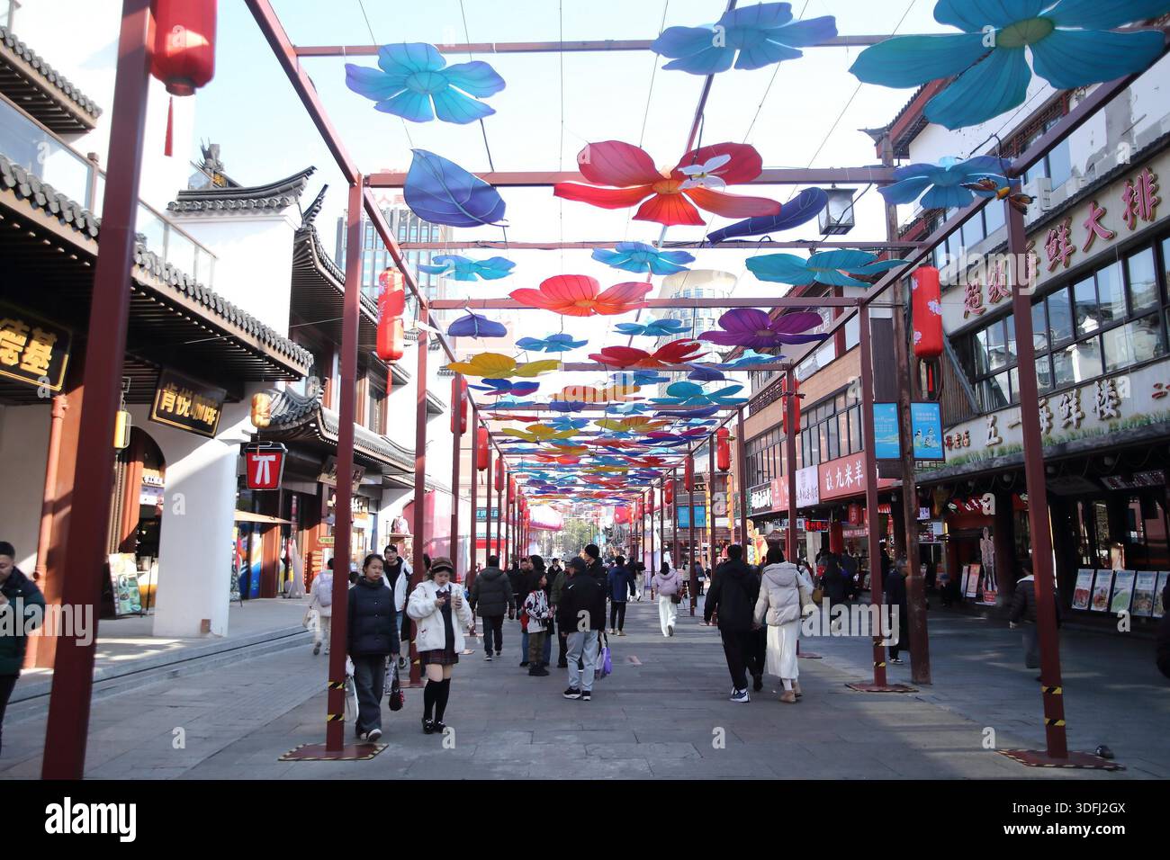 Visitors admire Lunar New Year lantern displays at Chenghuang Temple ...