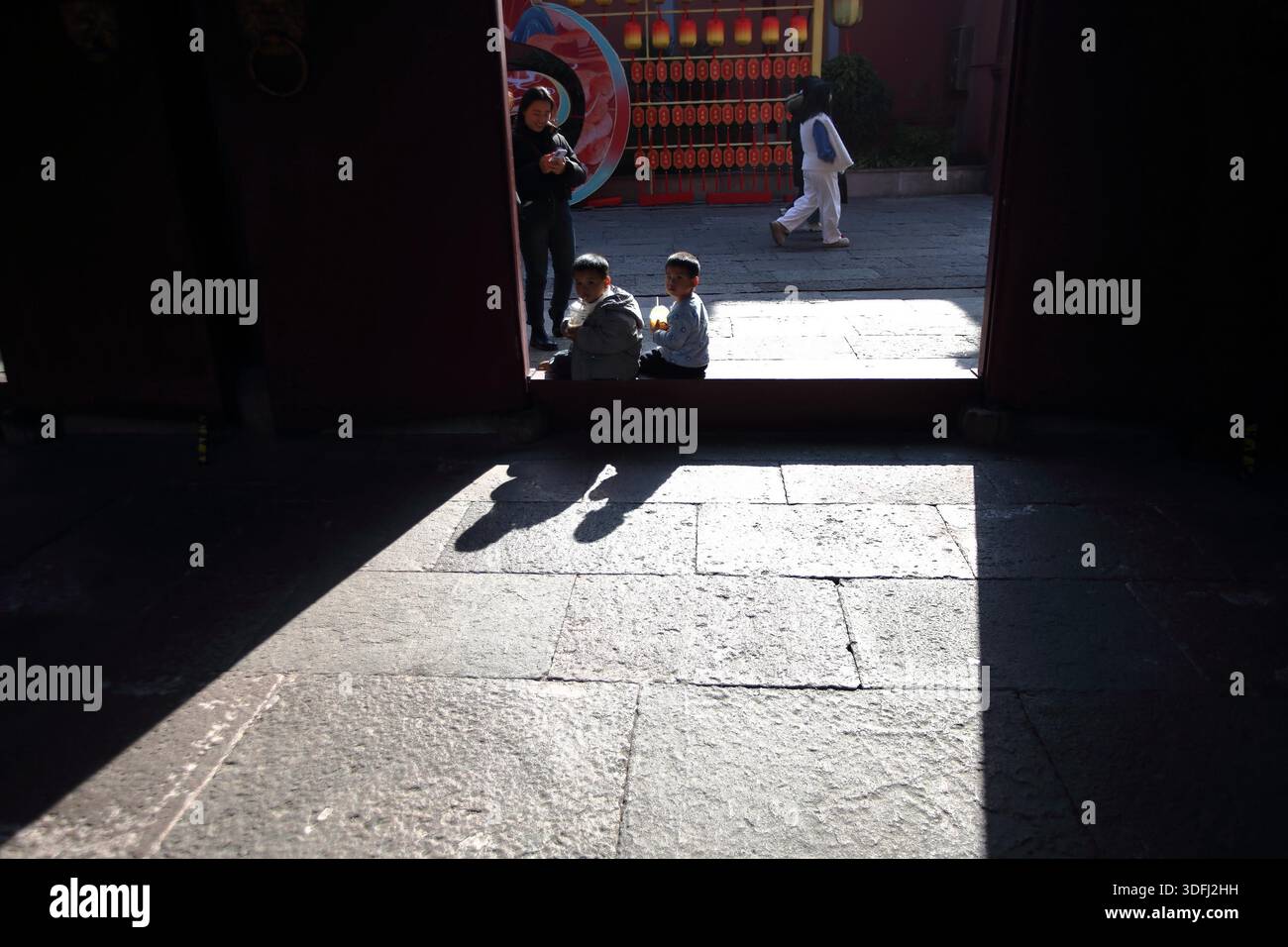 Visitors admire Lunar New Year lantern displays at Chenghuang Temple ...