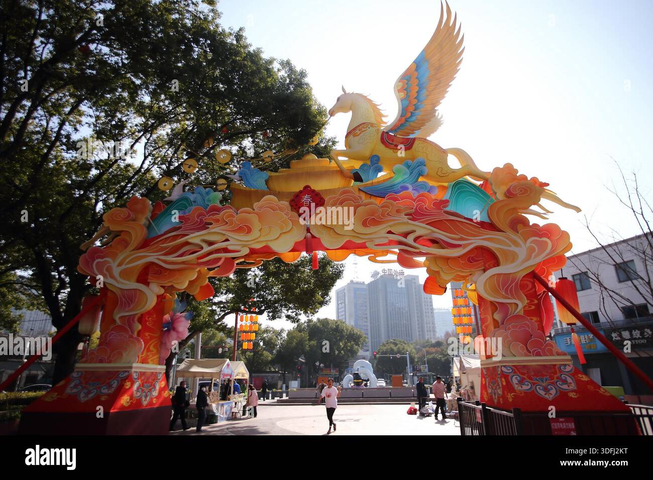 Visitors admire Lunar New Year lantern displays at Chenghuang Temple ...