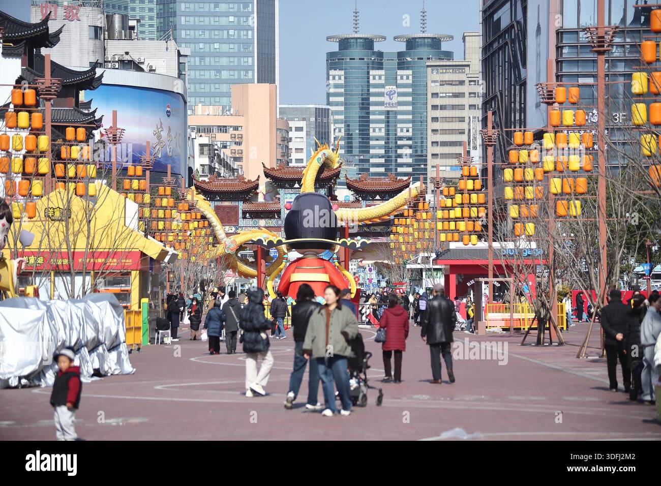 Visitors admire Lunar New Year lantern displays at Chenghuang Temple ...