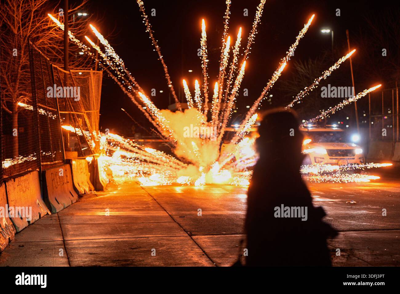 Fireworks are set off by protesters outside the Bishop Henry Whipple ...