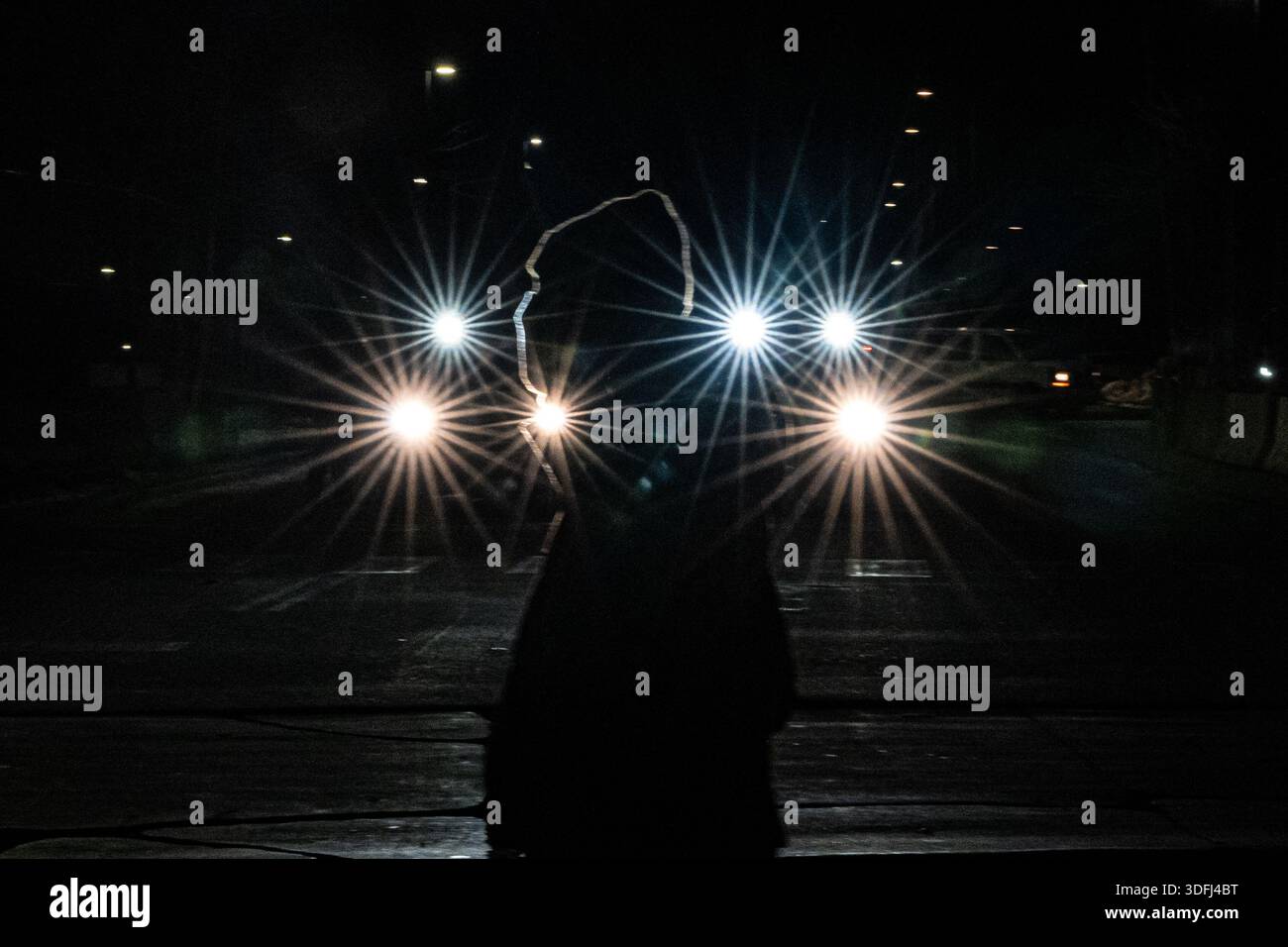 A protester walks outside Bishop Whipple Federal Building, Monday, Jan ...